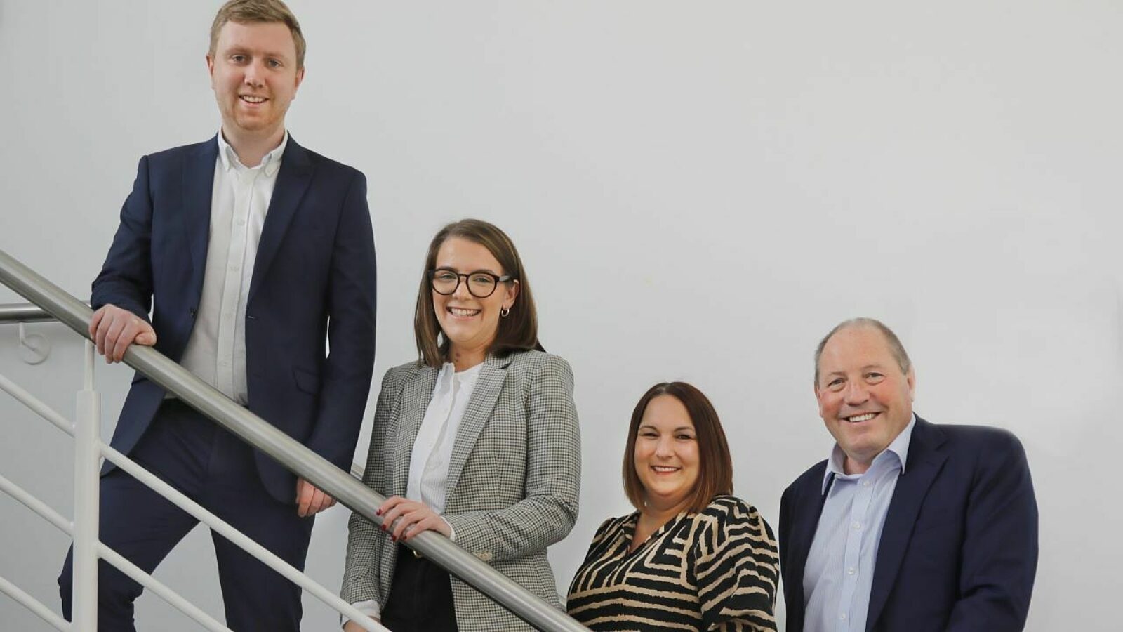 Innes England makes trio of promotions